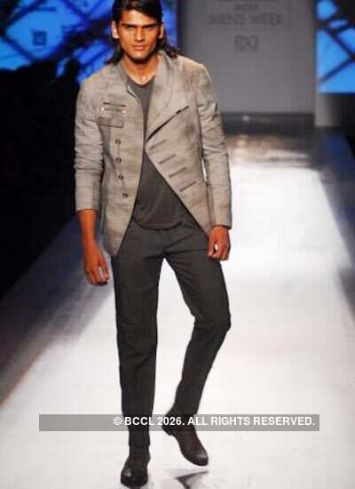 A model presents a creation by designers Rohit Gandhi and Rahul Khanna ...