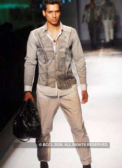 A model presents a creation by designers Rohit Gandhi and Rahul Khanna ...