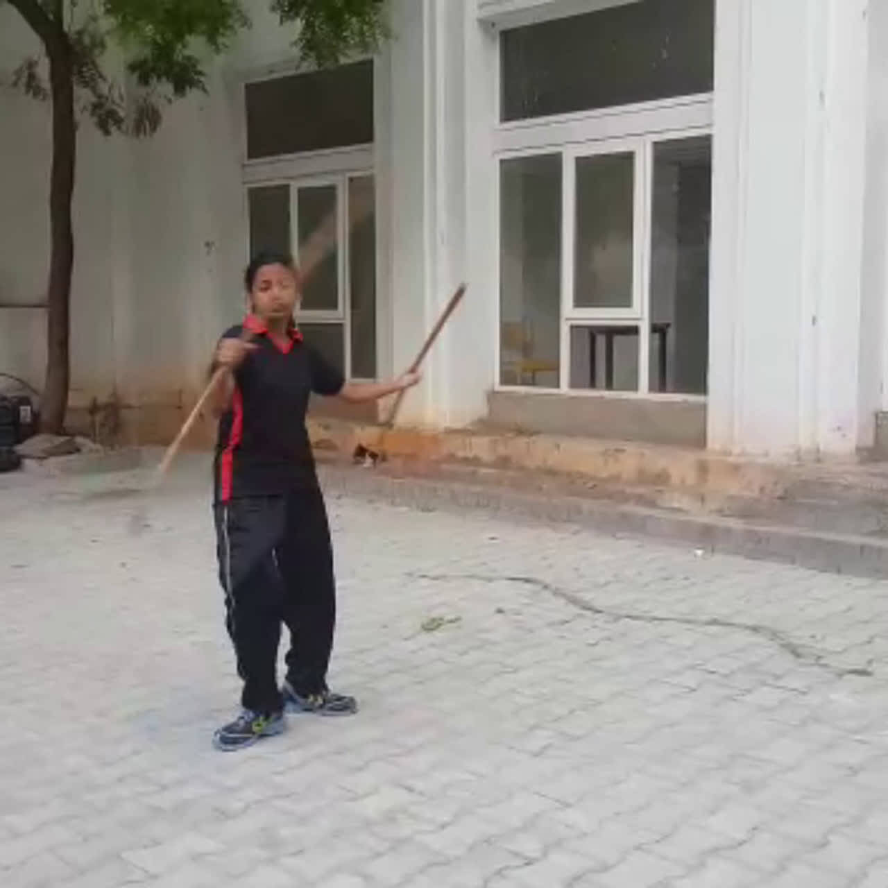 This girl's passion to swirl bamboo stick motivates many