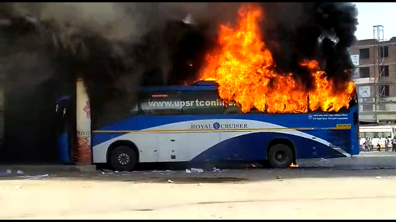 Watch: Activist sets fire to bus to catch government's attention