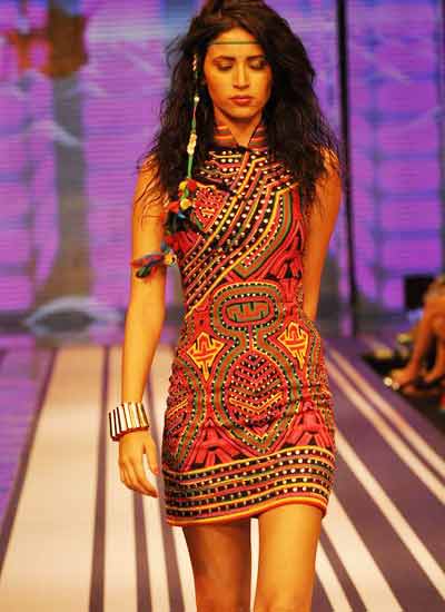 A model showcases a creation by designer Malini Ramani on Day 5 of ...