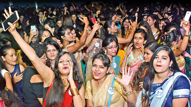 Teachers and students have fun at this freshers' party!