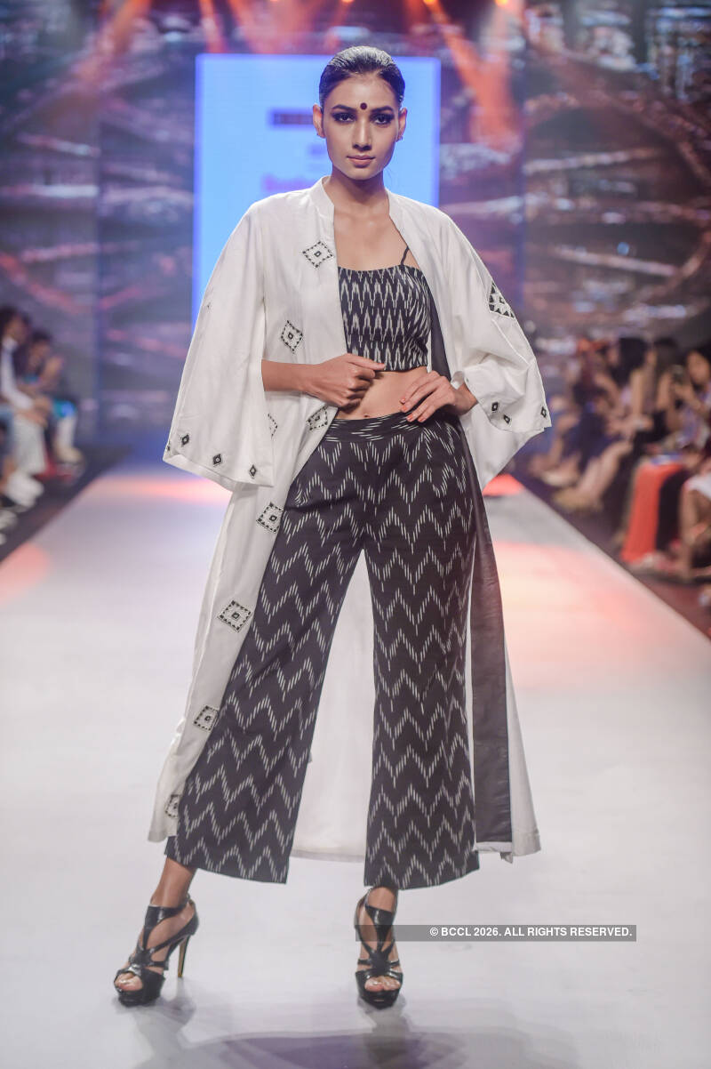 A model showcases a creation by designer Reemly on Day 2 of the Bombay ...