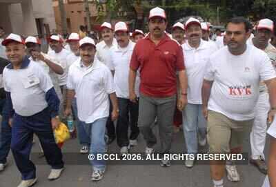 Home Minister R Ashok talking part in the 3 km walkathon to observe ...