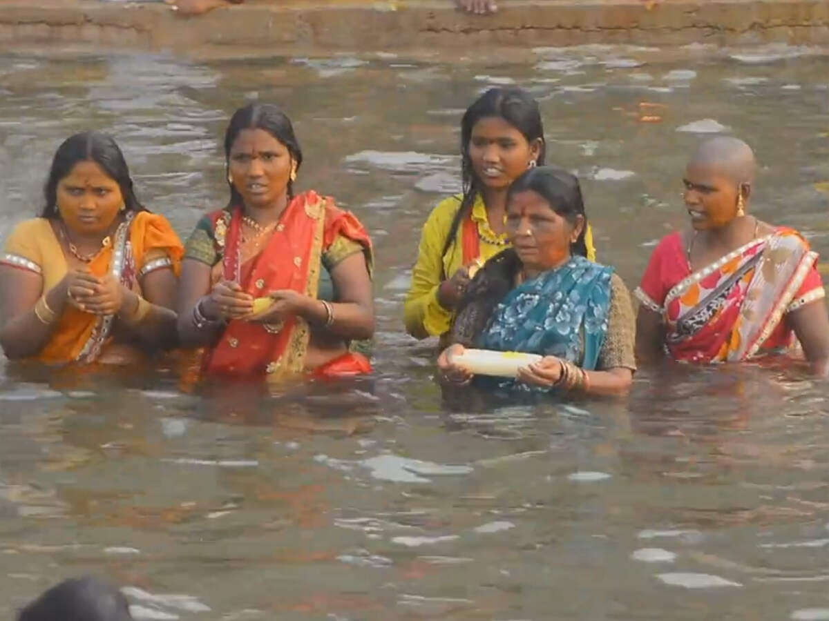 Watch: Devotees take holy dip in River Krishna on first Monday of ...