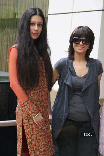 A model during her fitting sessions for upcoming Amby Valley fashion ...