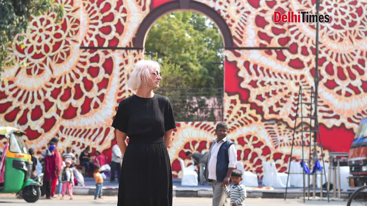Polish artist dedicates her red mural to 'colorful' Delhi