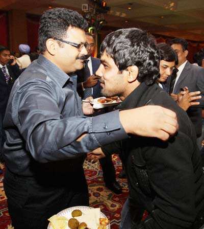 Commerce and Industry Minister Anand Sharma felicitates boxer Suranjoy ...