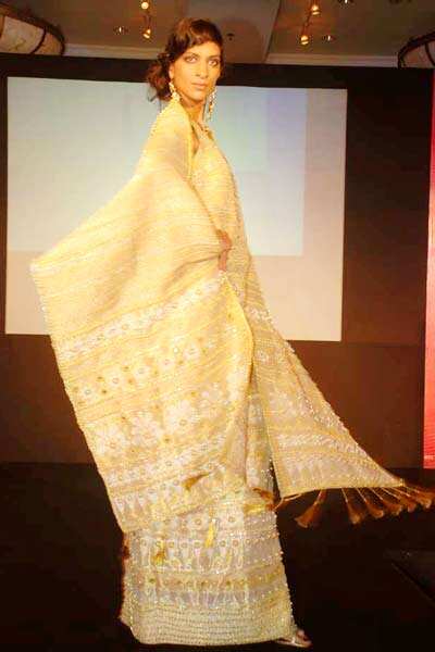 Model showcases a creation during 'Paris Region Trade 2010' at JW ...