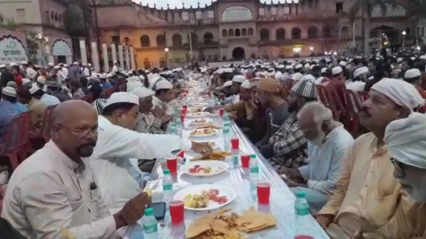 Muslims break Roza at Iftar party on the first day of Ramzan