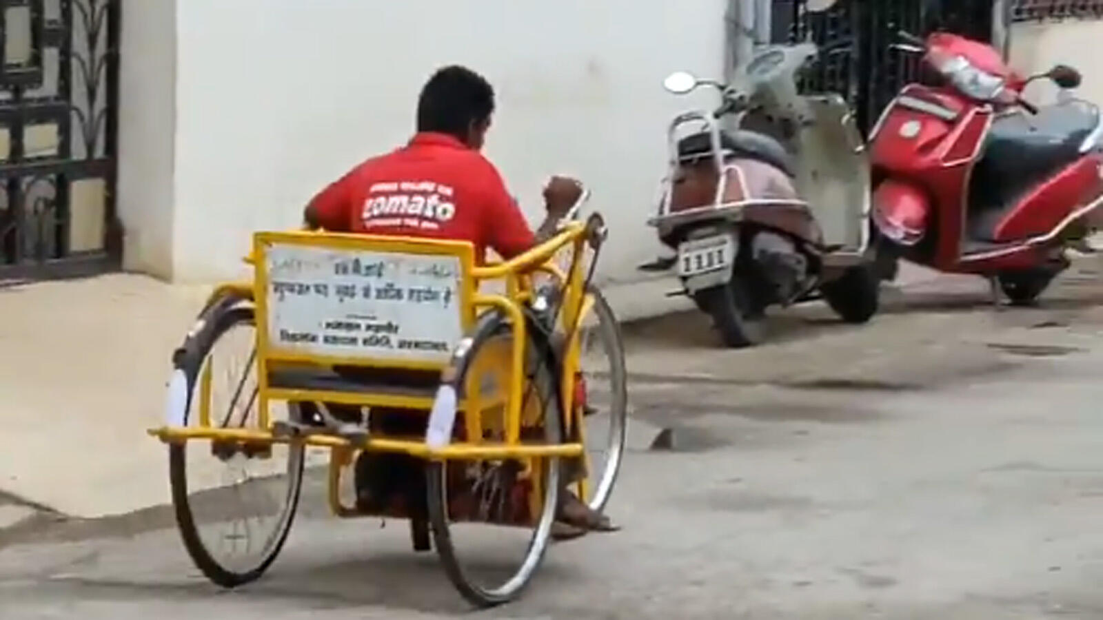 Differently-abled man delivers food on hand-pulled tricycle, video goes ...