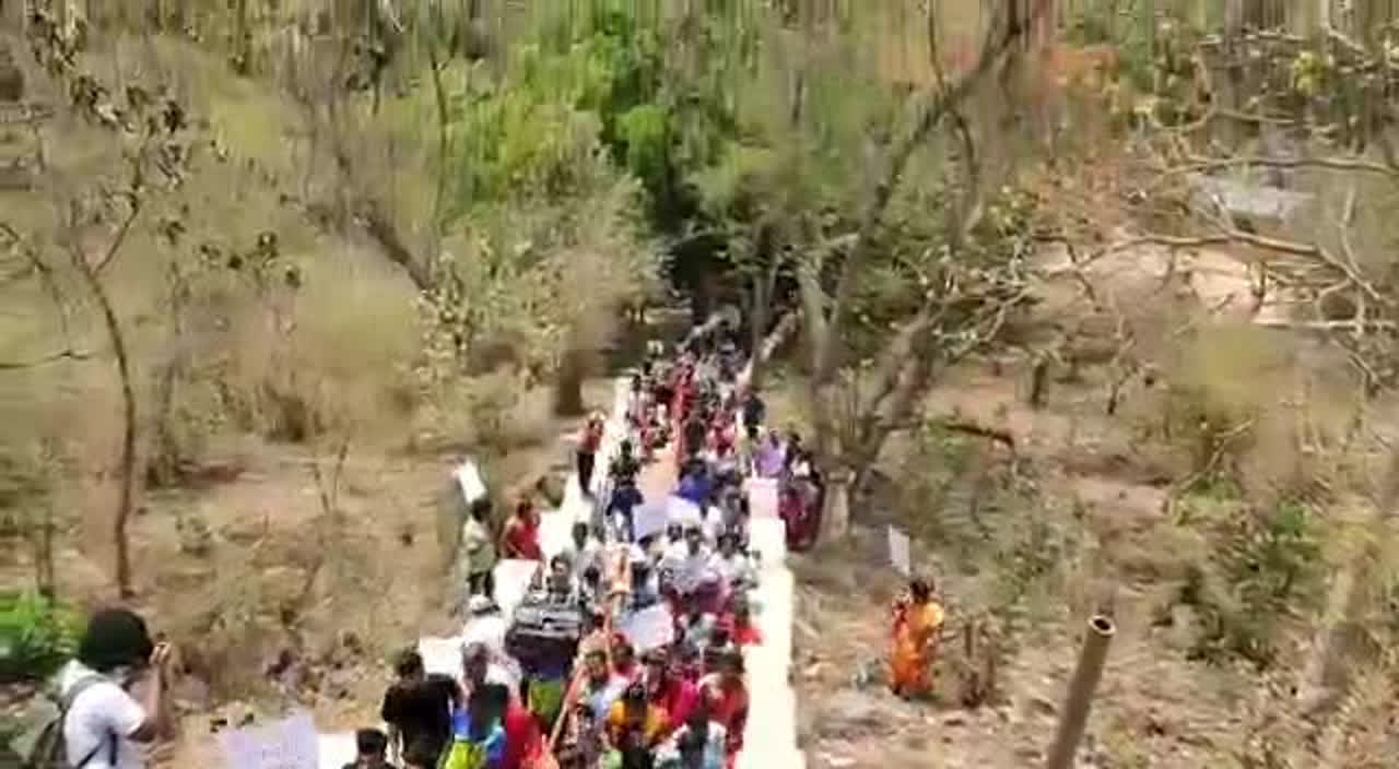 Women in Aarey climb to the Waghoba Temple to pray that the Adivasi ...