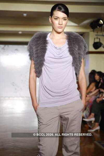 A model displays a creation during Marc Cain show at JW Marriott ...