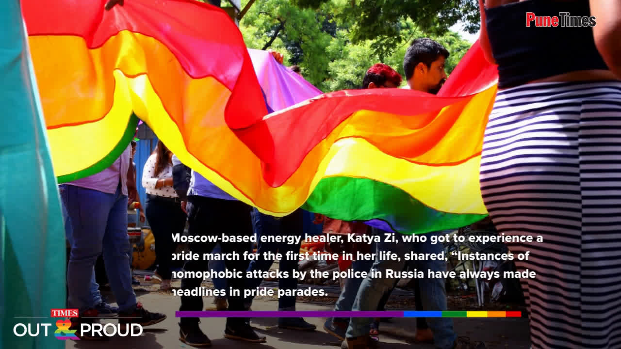 Members from the LGBTQIA community walk the march with pride