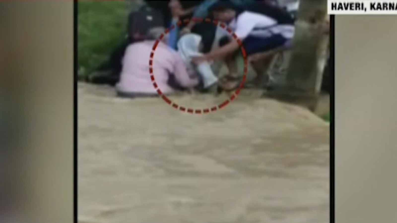 Dramatic! Girl students fall in open drain on a flooded road, rescued ...