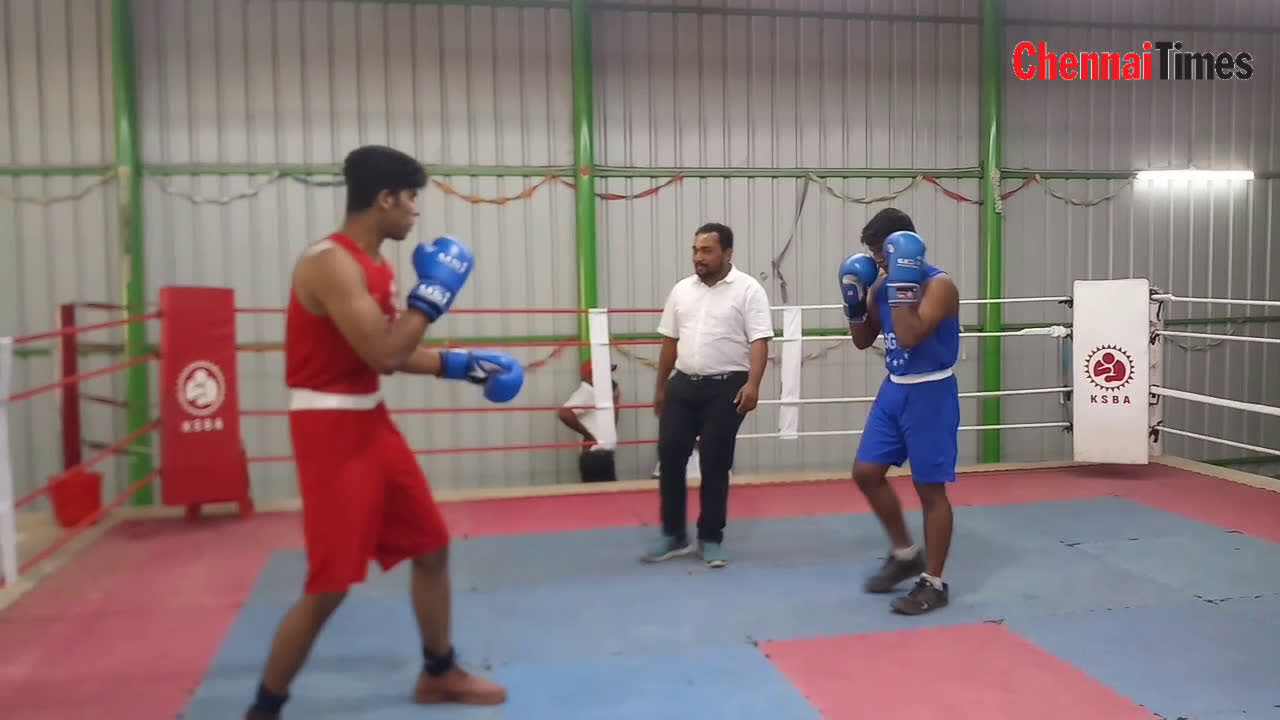 Boxers in action during the district level boxing championship at Nehru ...