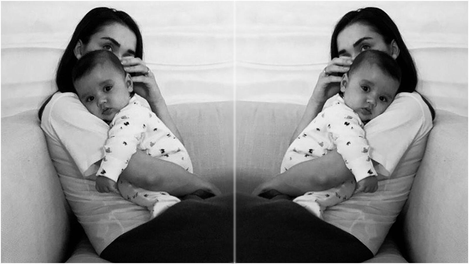 This picture of Amy Jackson comforting her baby boy Andreas will melt ...