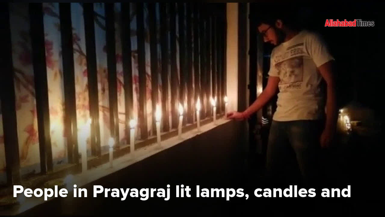 People in Prayagraj light lamps and candle to show solidarity