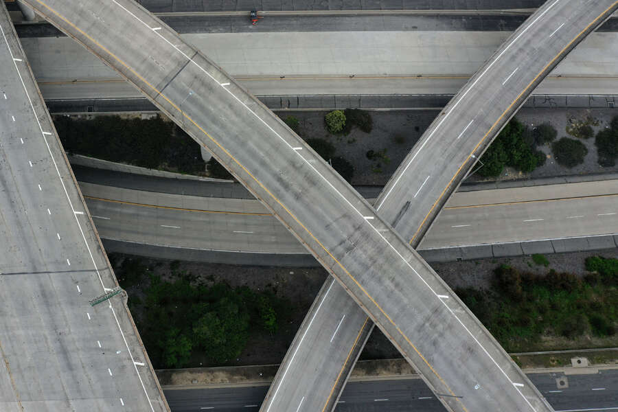An empty freeway intersection is seen two days before Earth Day, after ...