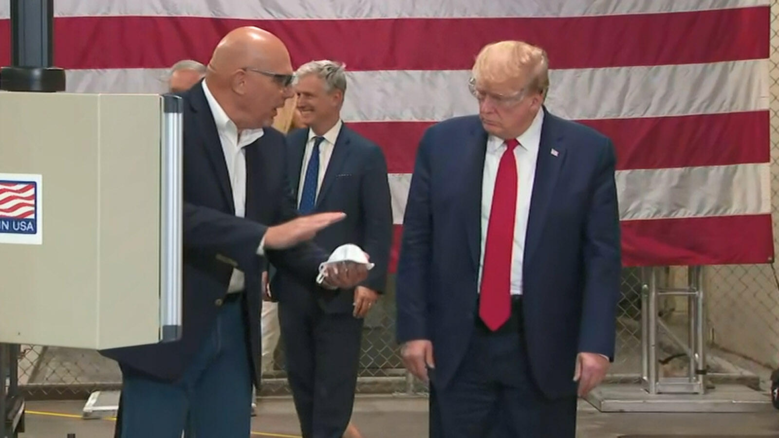 Without mask, Trump tours Arizona face mask plant
