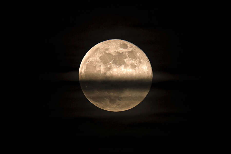 The last super moon of 2020, also known as the Flower Moon rises in ...