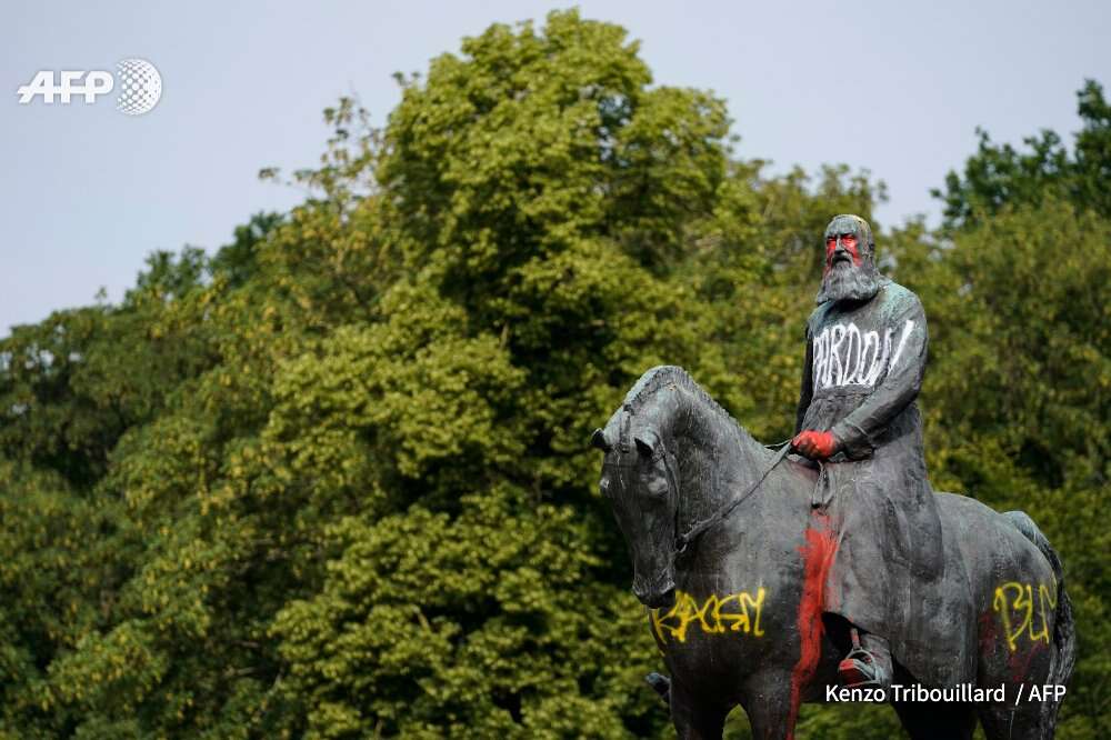 In Photos: Protesters deface statues of enslavers and colonisers ...