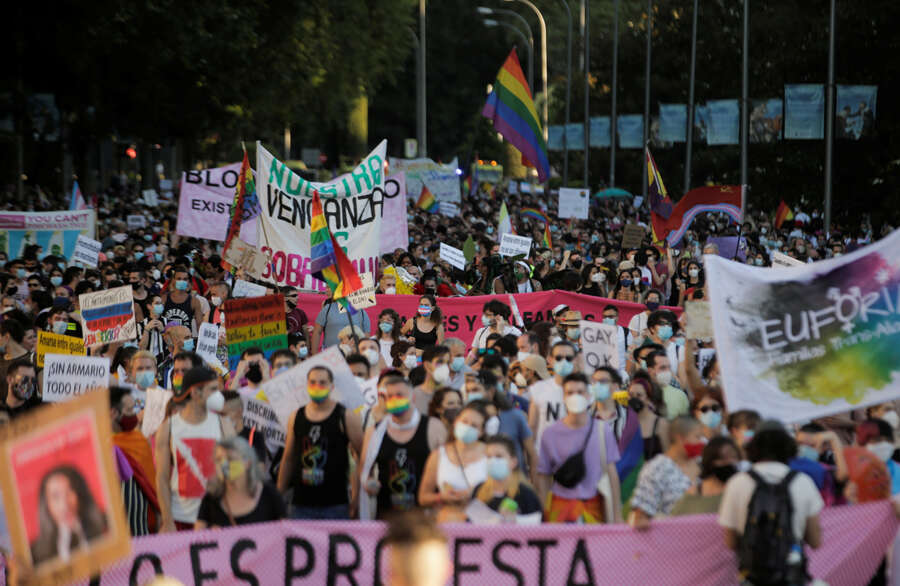 People lie on the street for a die-in to support the LGBTQ community ...