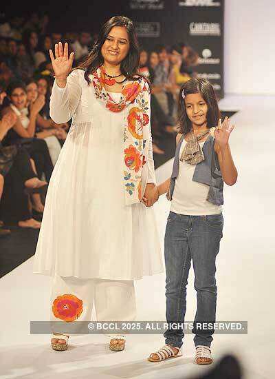 A model showcases a creation by designer Purvi Doshi on Day 5 of the ...