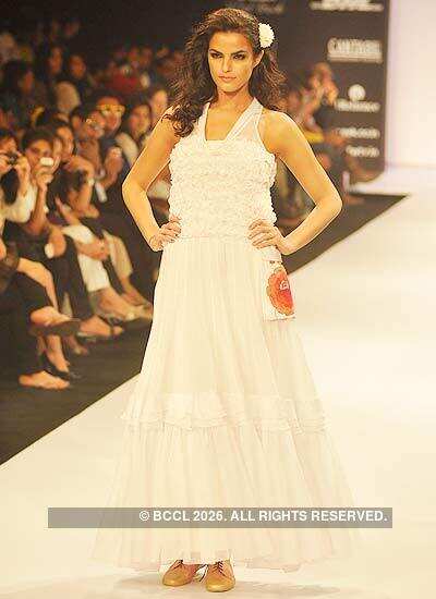 A model showcases a creation by designer Purvi Doshi on Day 5 of the ...