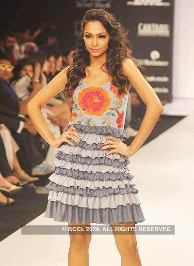A model showcases a creation by designer Purvi Doshi on Day 5 of the ...