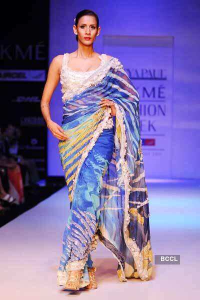 A model showcases a creation by designer Satya Paul on final day of the ...