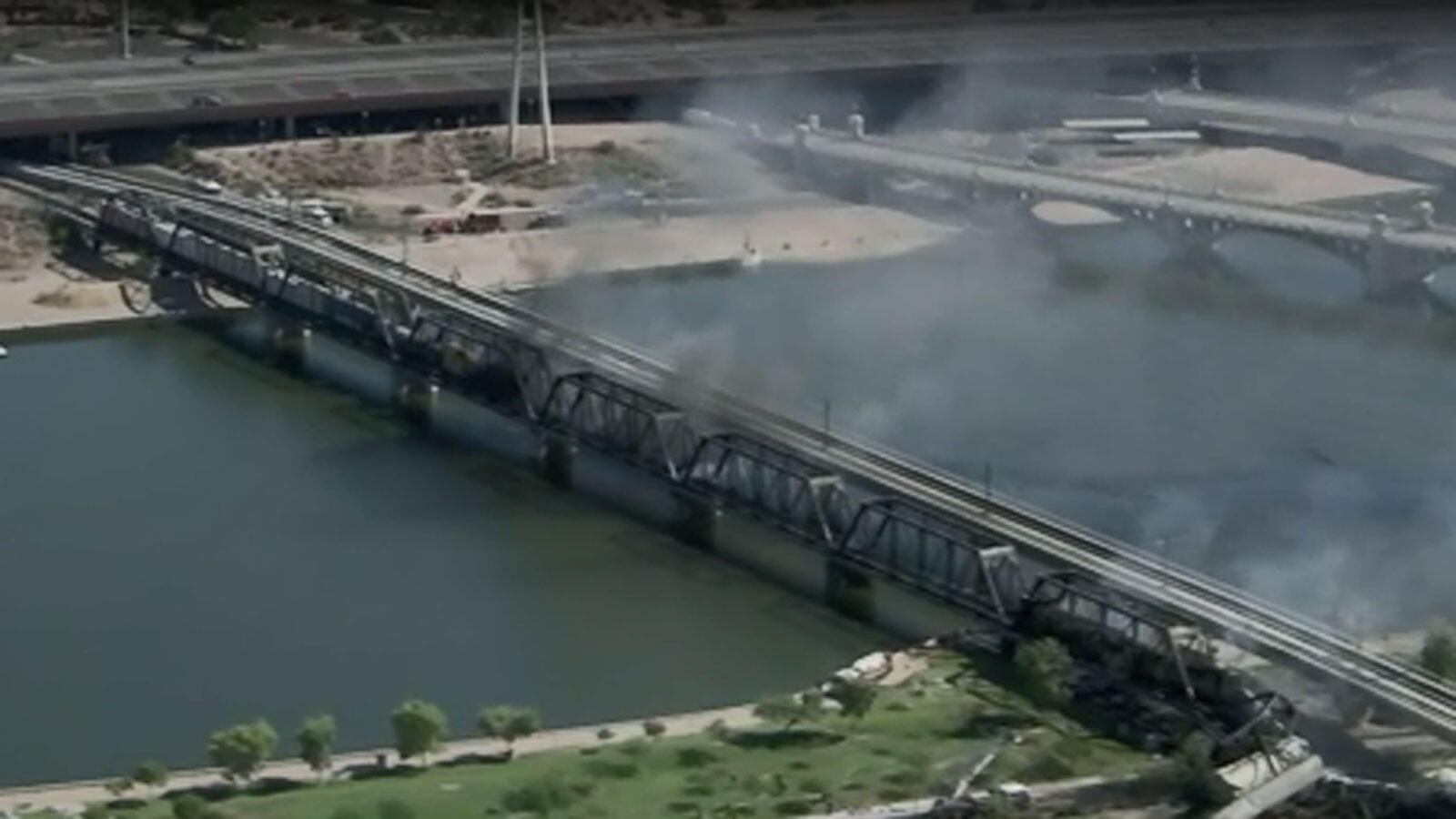 Arizona train derailment causes bridge collapse, fire
