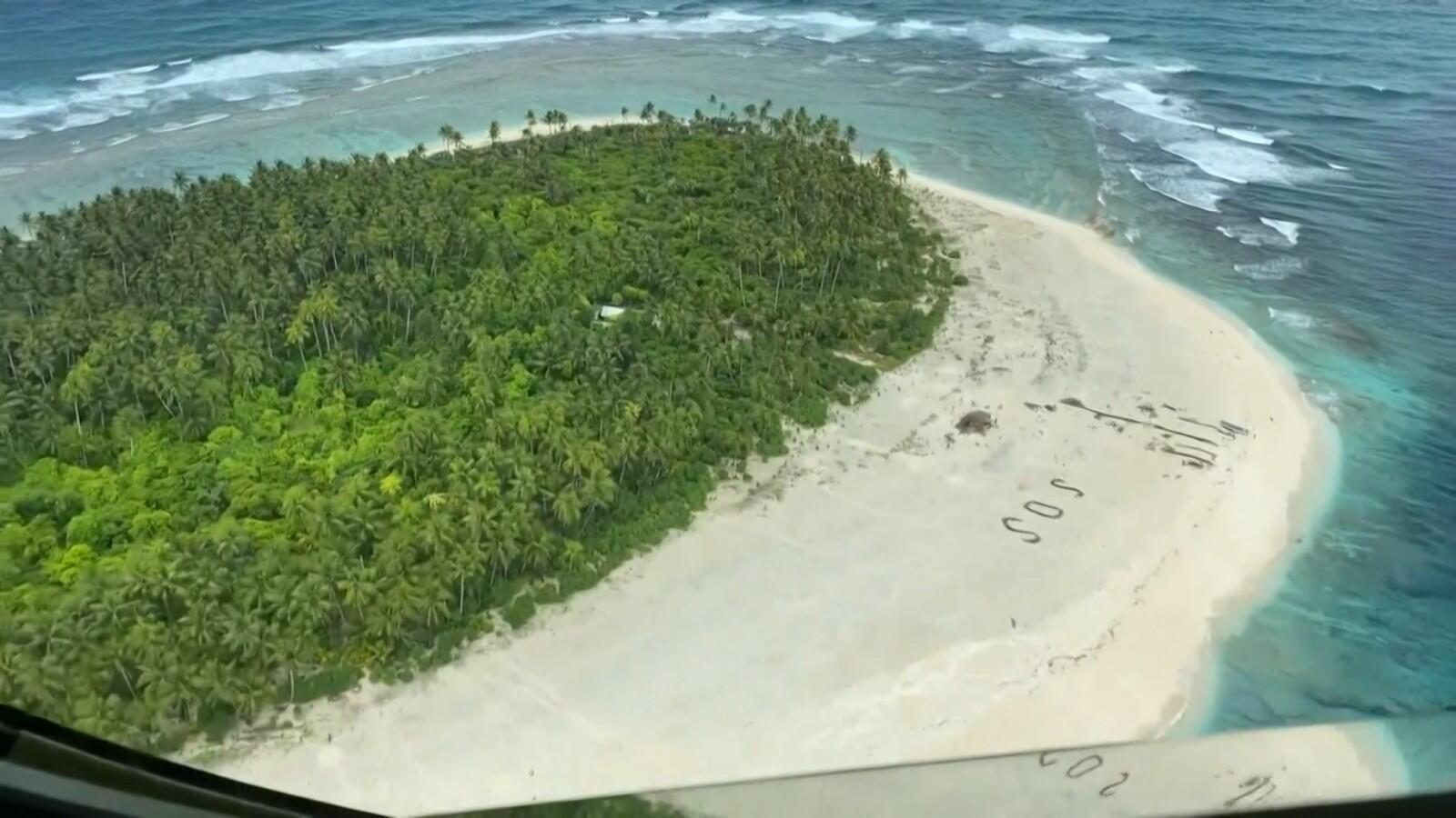 3 men write SOS in sand, rescued from island
