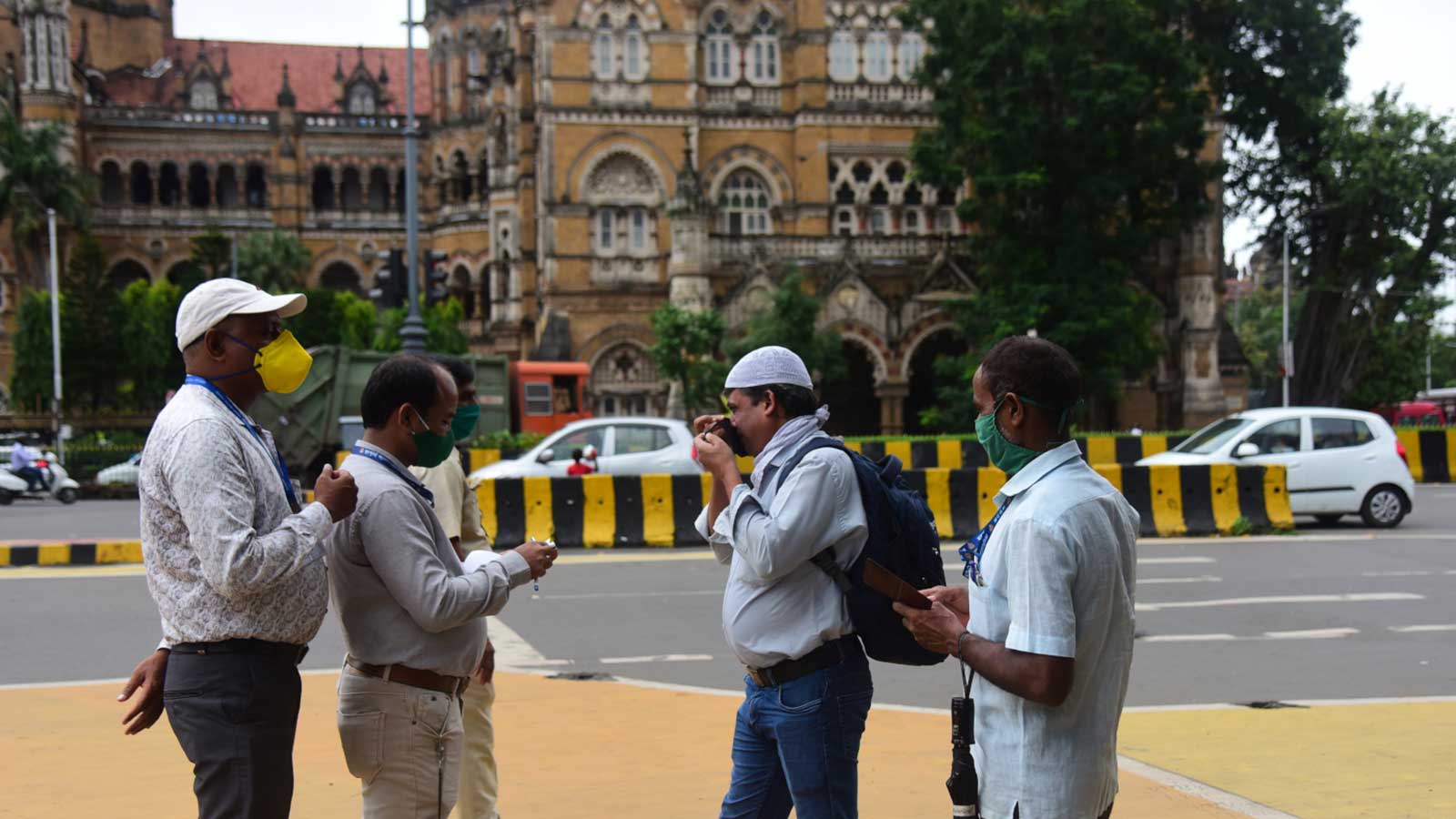 People without face masks caught and fined outside CSMT station by BMC ...