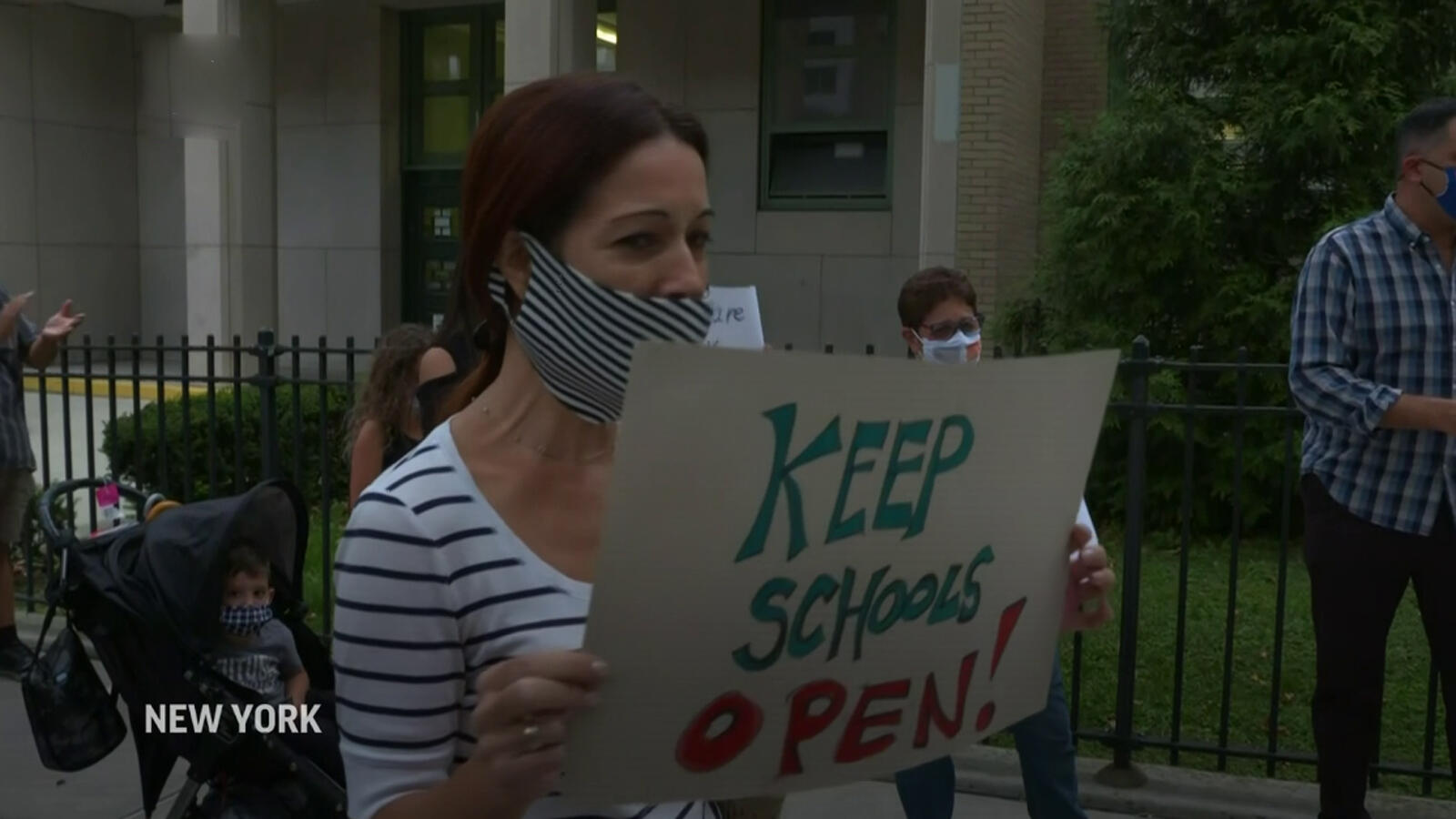 US: Parents protest school closures in virus spike areas