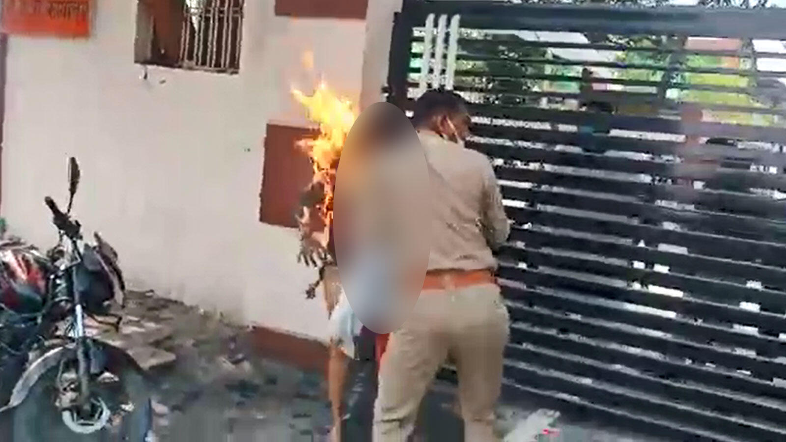 Shocking visuals: Woman sets herself on fire allegedly over harassment ...