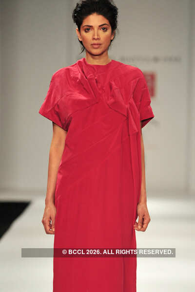 A model showcases a creation by designer Kallol Datta on Day 1 of the ...