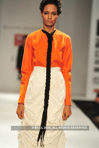 Pia Trivedi showcases a creation by designer Kallol Datta on Day 1 of ...