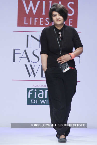 A model showcases a creation by designer Mrinalini on Day 3 of the ...