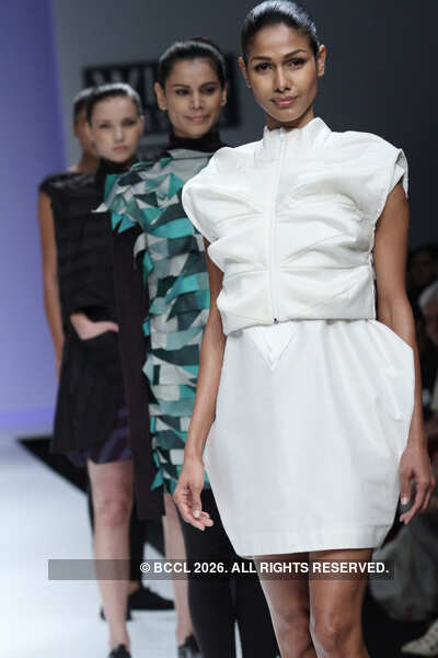 A model showcases a creation by designer Mrinalini on Day 3 of the ...