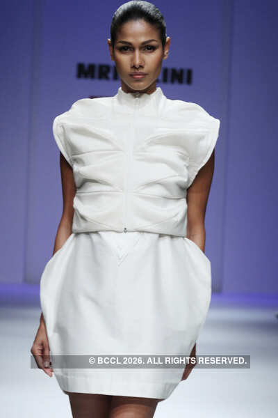 A model showcases a creation by designer Mrinalini on Day 3 of the ...