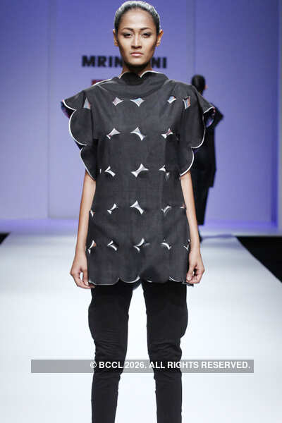 A model showcases a creation by designer Mrinalini on Day 3 of the ...