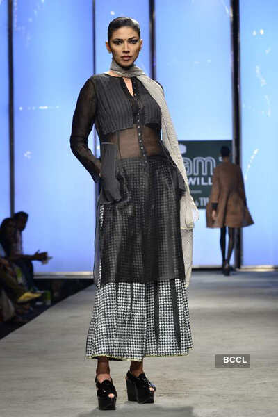 Model showcases a creation by designers Abraham and Thakore on Day 4 of ...