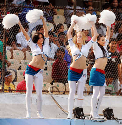 Cheerleaders perform during the IPL-4 cricket match between Deccan ...