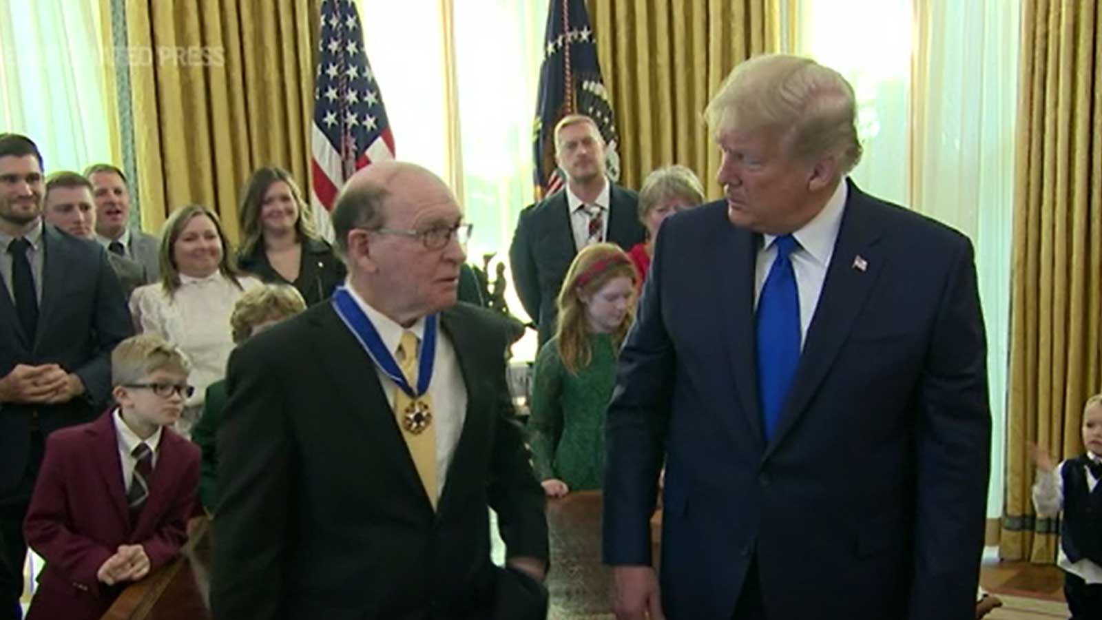 Trump honours legendary Iowa wrestler Dan Gable