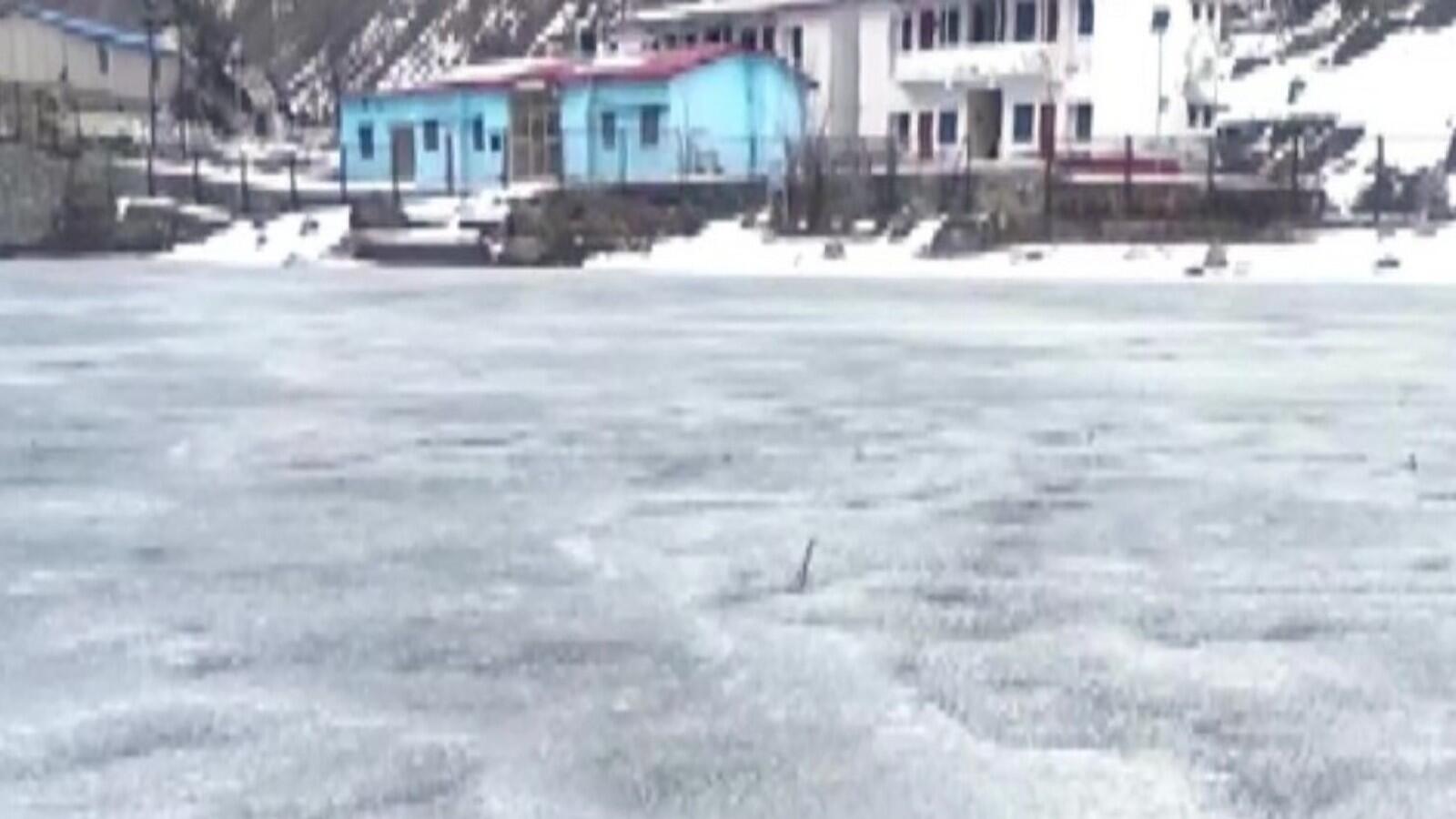 Badrinath covered in white sheet of snow, Shesh Netra Lake freezes partly