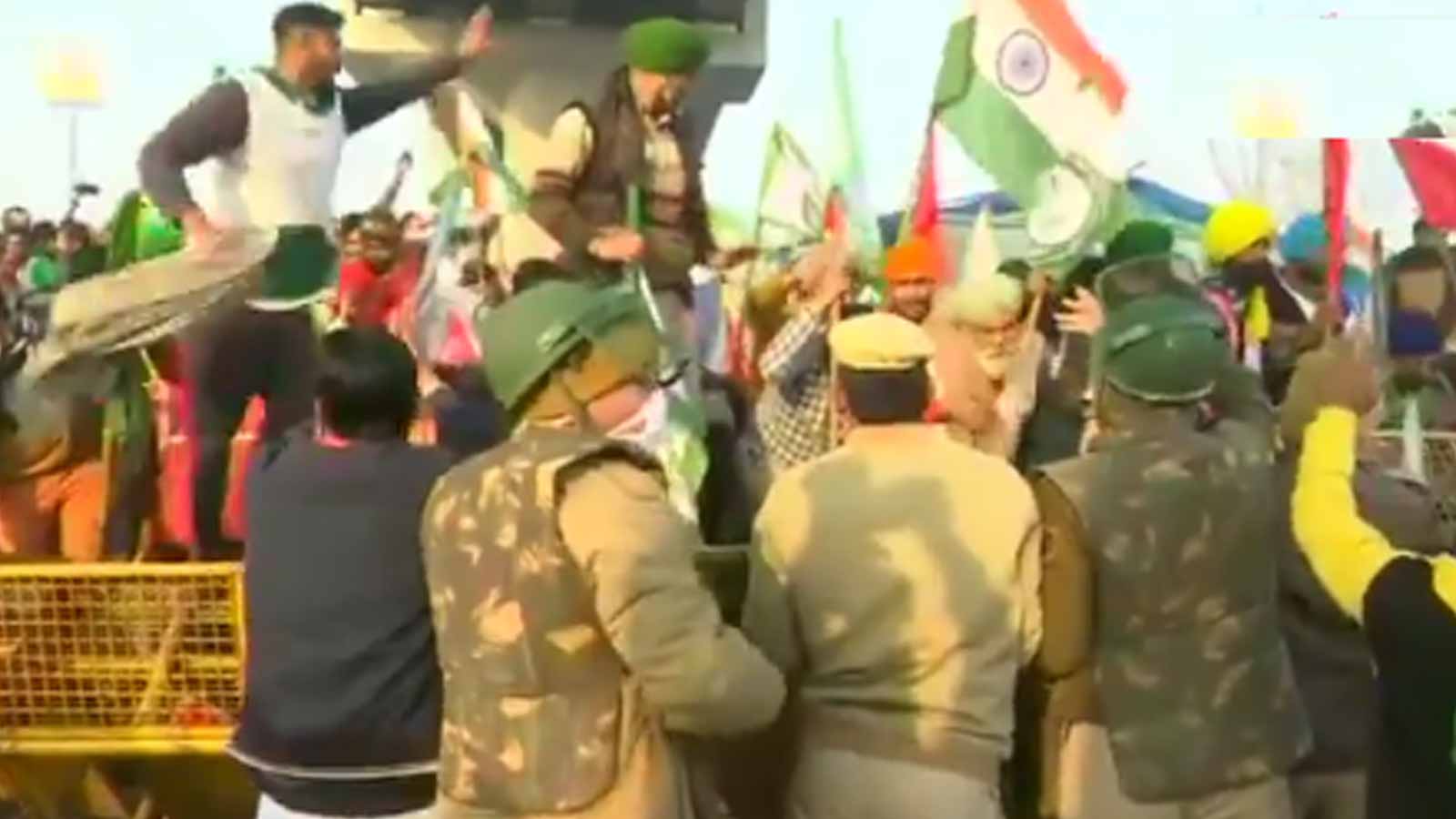 Protesting farmers break barricade at Tikri border, enter Delhi