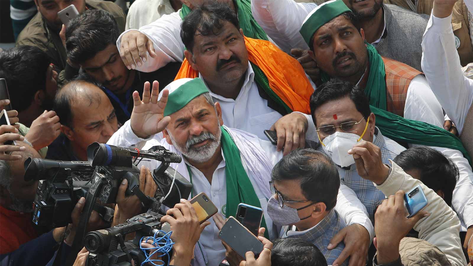 Shiv Sena leader Sanjay Raut meets farmer leader Rakesh Tikait at ...