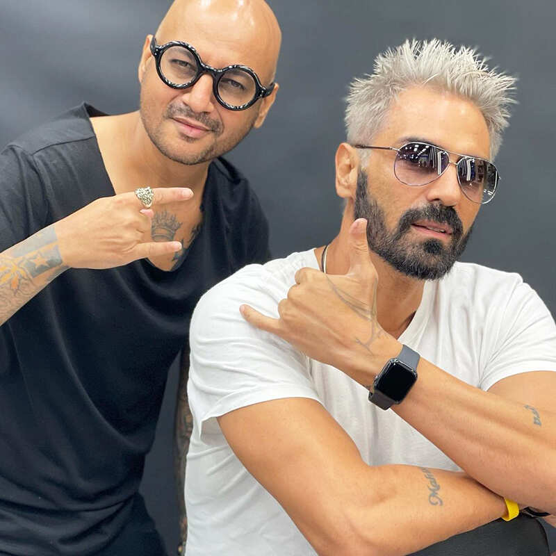 Pictures of Arjun Rampal flaunting his new look in platinum blonde hair ...