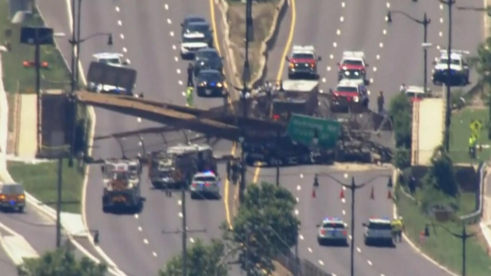 5 injured after a bridge collapses over DC highway